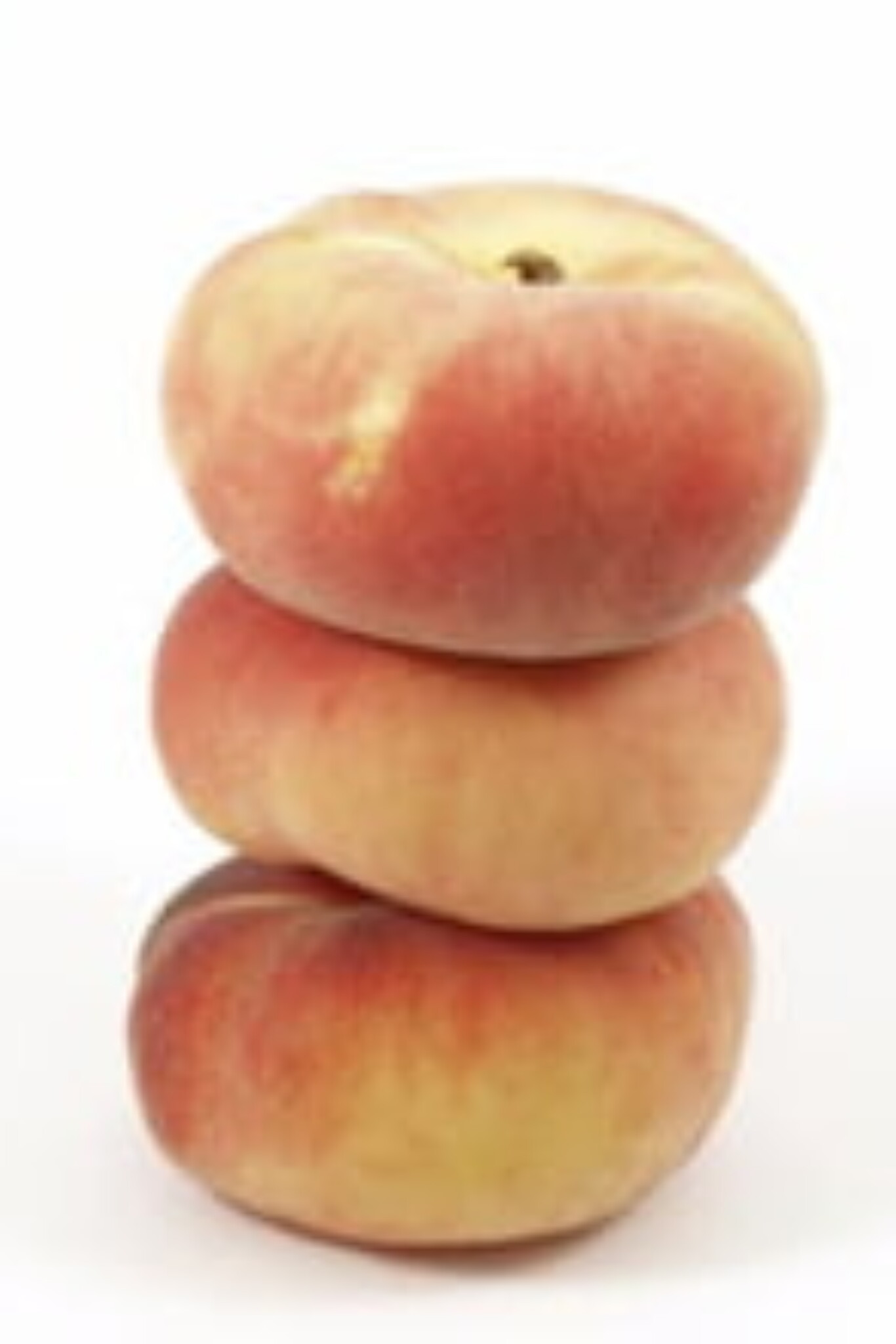 gepocheerde perziken met steranijs | delicious.magazine